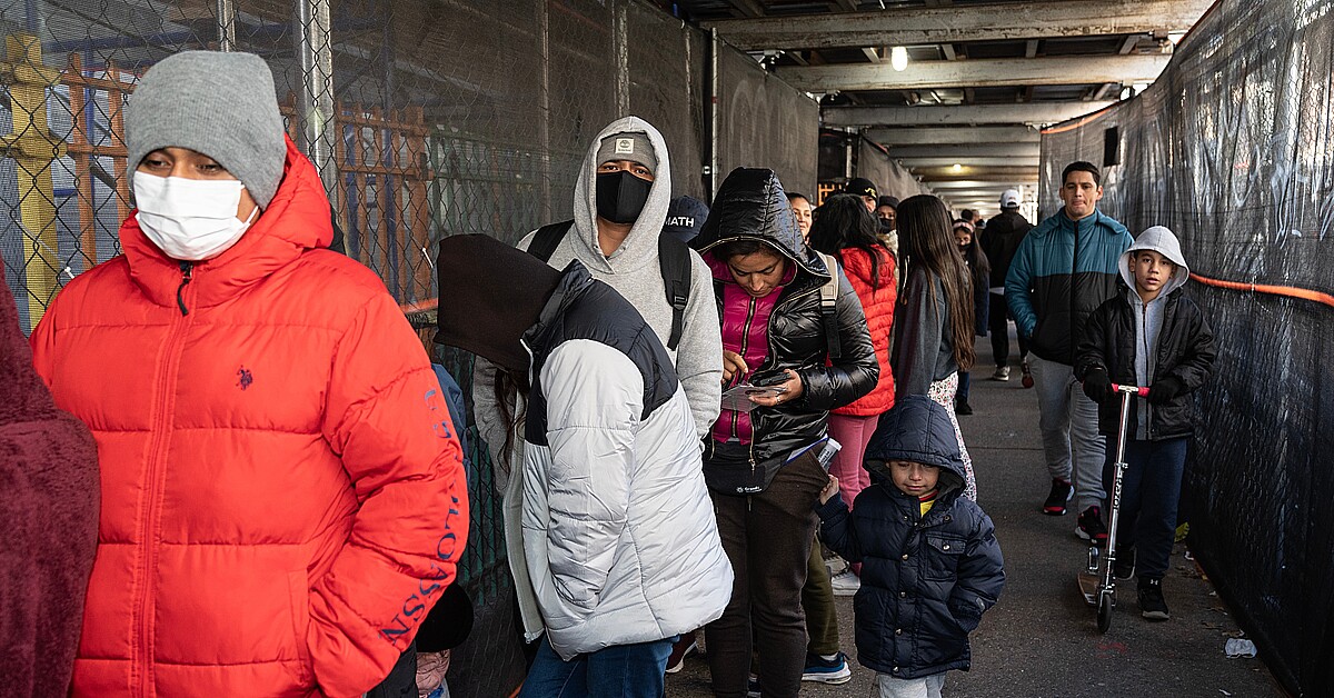 NYC migrants forced to sleep outdoors as shelters hit full capacity ...